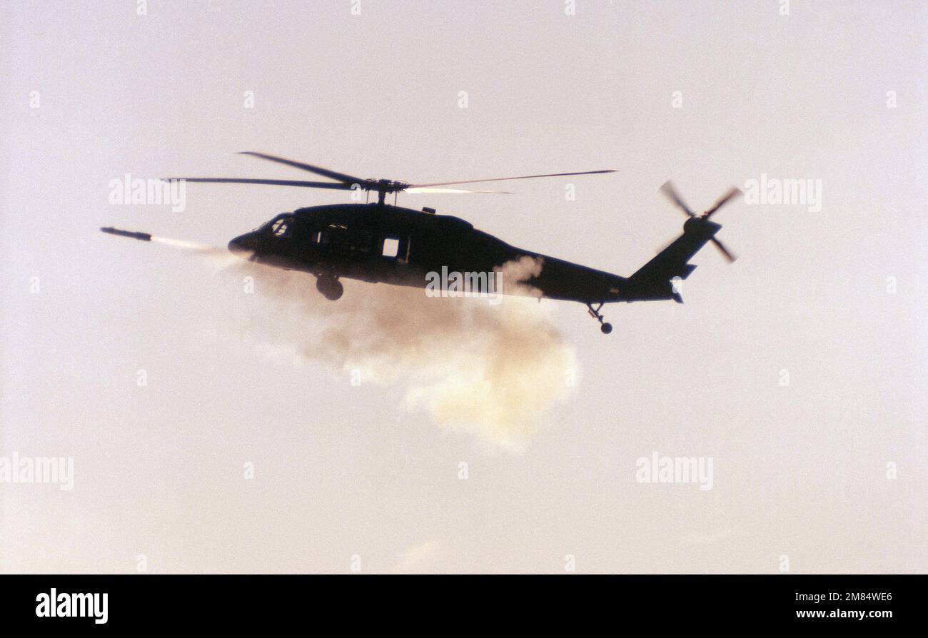 Helicopter fires hellfire missile hi-res stock photography and images ...