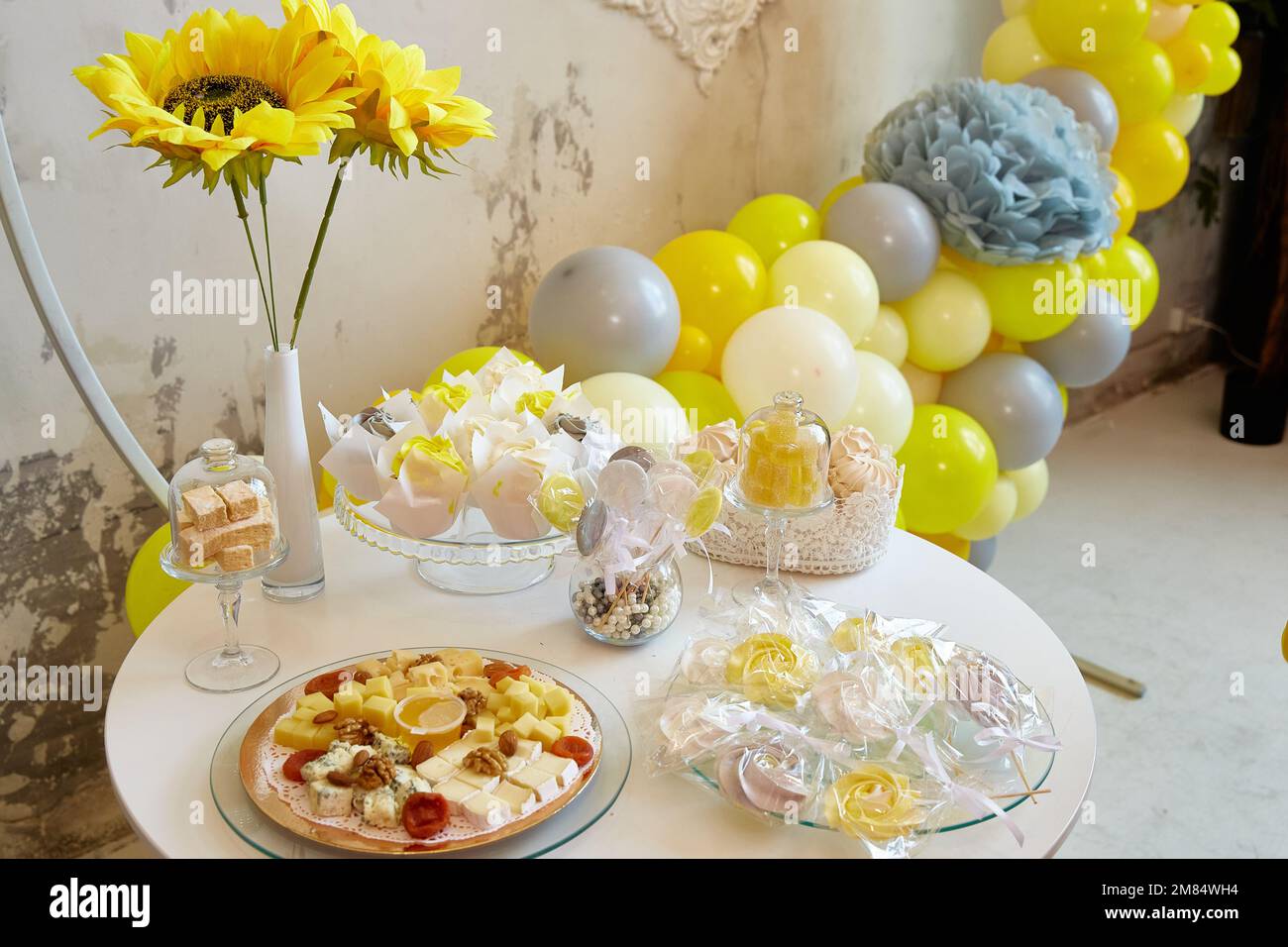 Delicious sweet holiday buffet with cupcakes, meringues and other ...