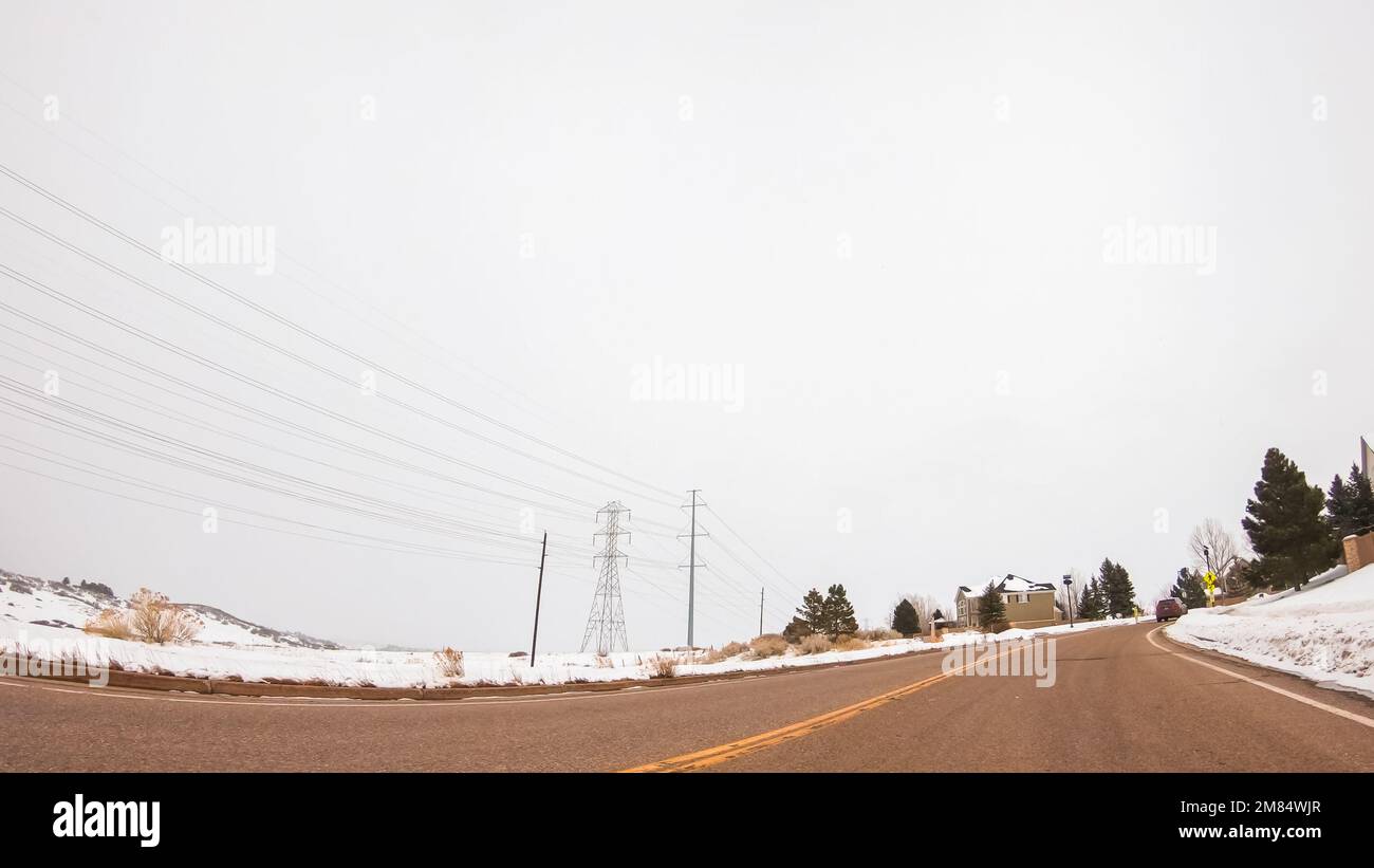 Driving in suburban area Stock Photo - Alamy