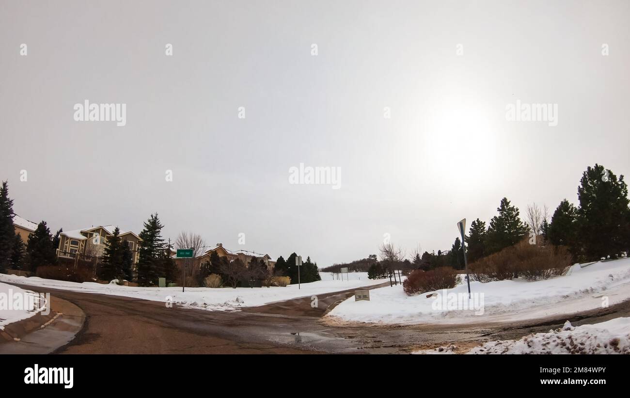 Driving in suburban area Stock Photo - Alamy