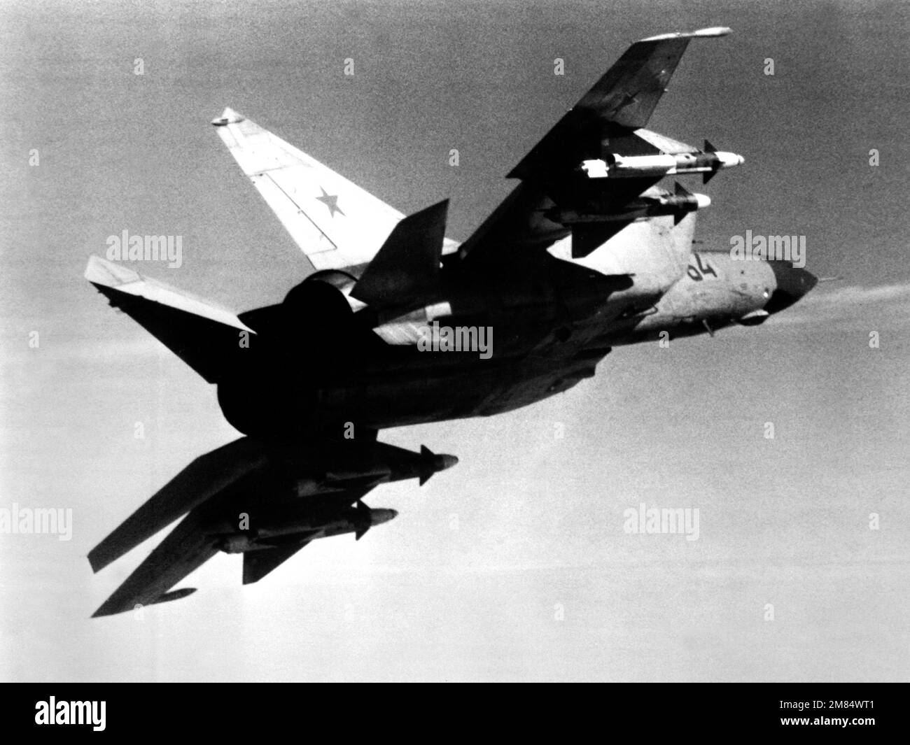 An air-to-air right underside rear view of a Soviet MiG-25 Foxbat ...
