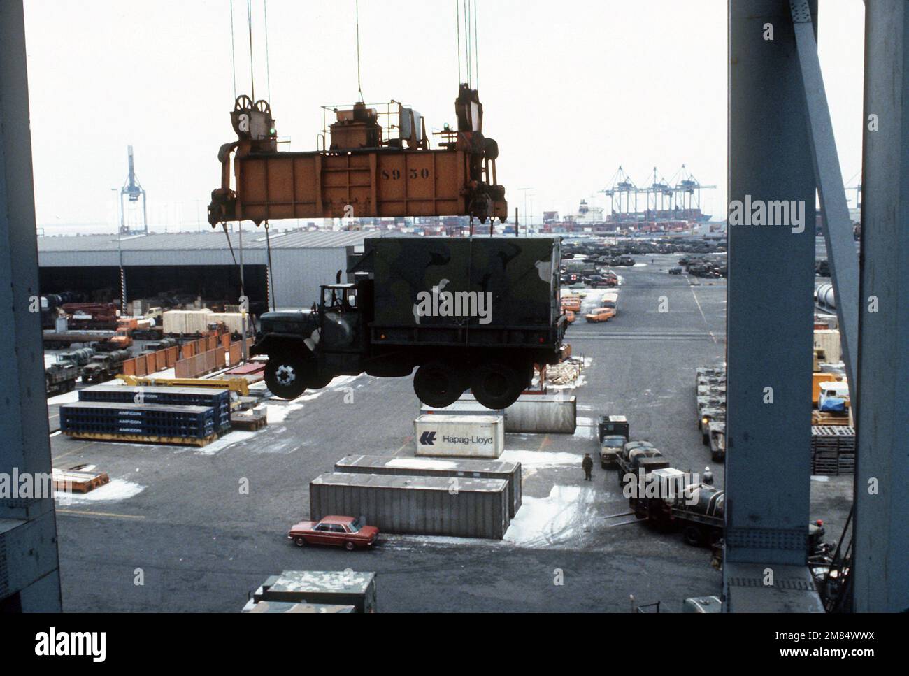 An M-35A2 2 1/2-ton cargo truck is loaded on the vehicle cargo/rapid ...