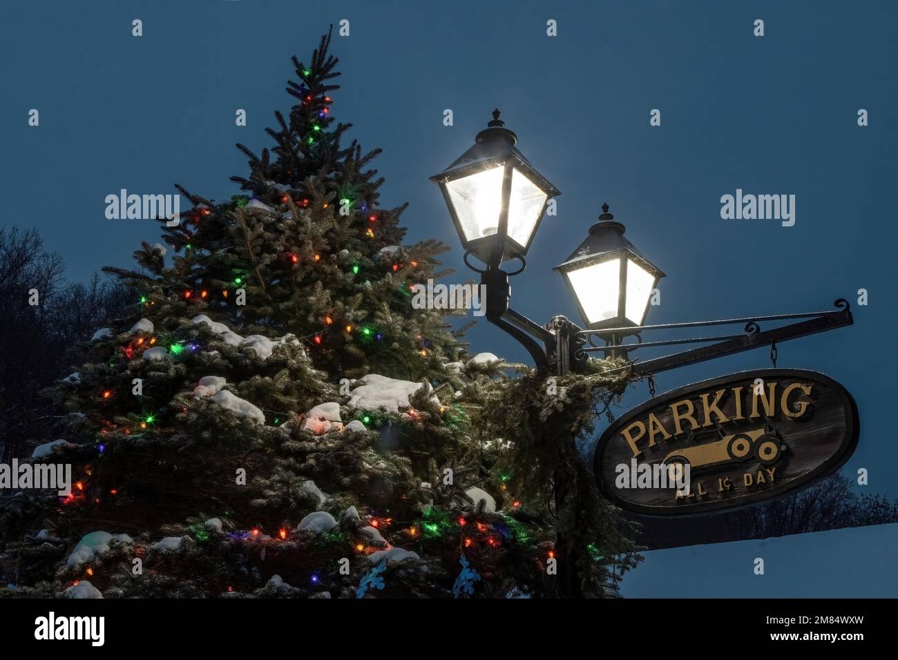 Lighted Christmas tree with street lamps and a vintage parking for 1 ...