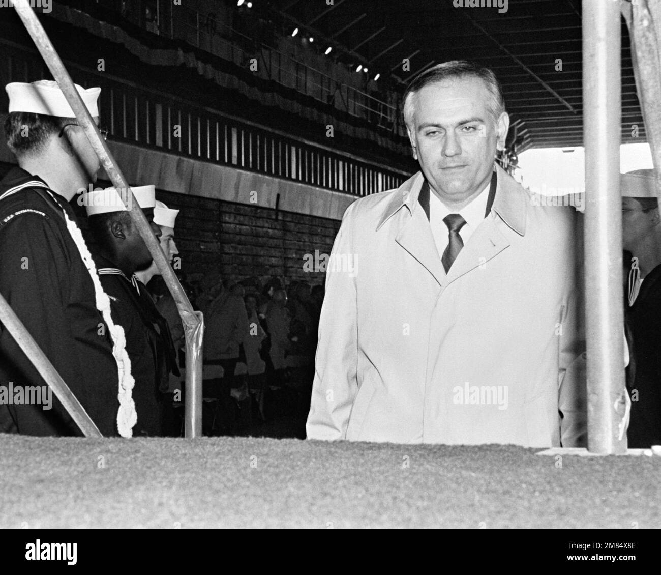 Joseph R. Santosuosso, president, Lockheed Shipbuilding Co, climbs the ...