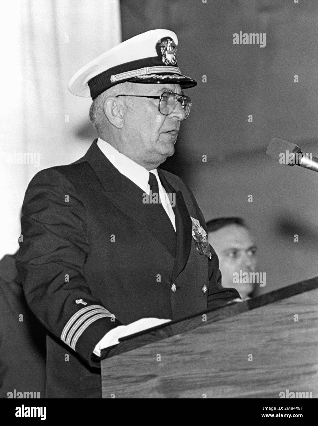 Chaplain (CMDR.) Richard P. Beck delivers the invocation during the ...