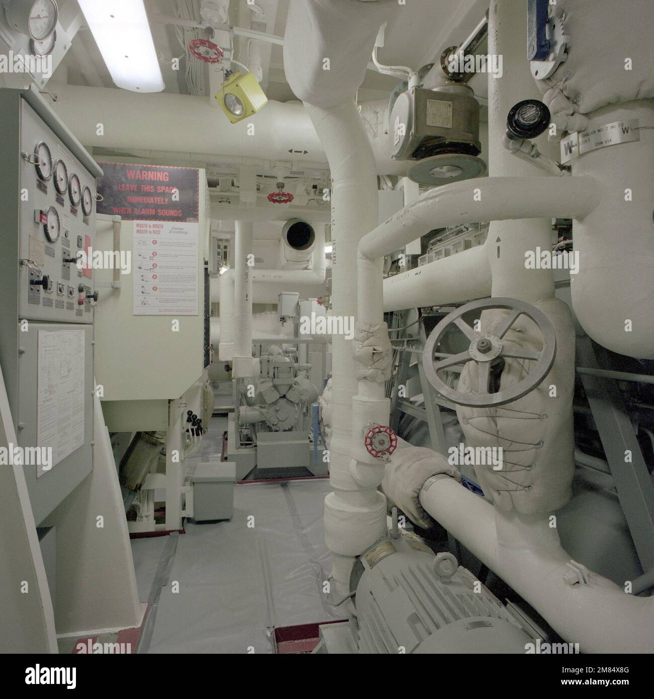 A view of the auxiliary machinery room No. 2 aboard the guided missile ...