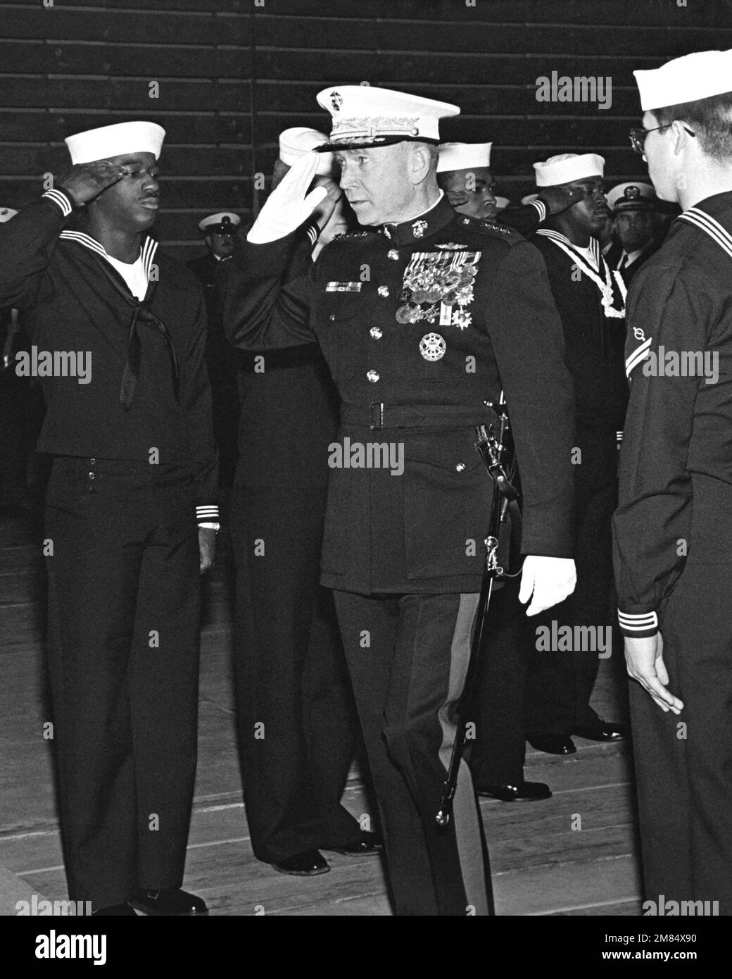 GEN. Paul X. Kelley, commandant of the Marine Corps, salutes as he ...