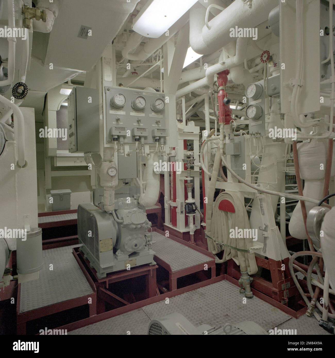 A view of the auxiliary machinery room No. 1 aboard the guided missile ...