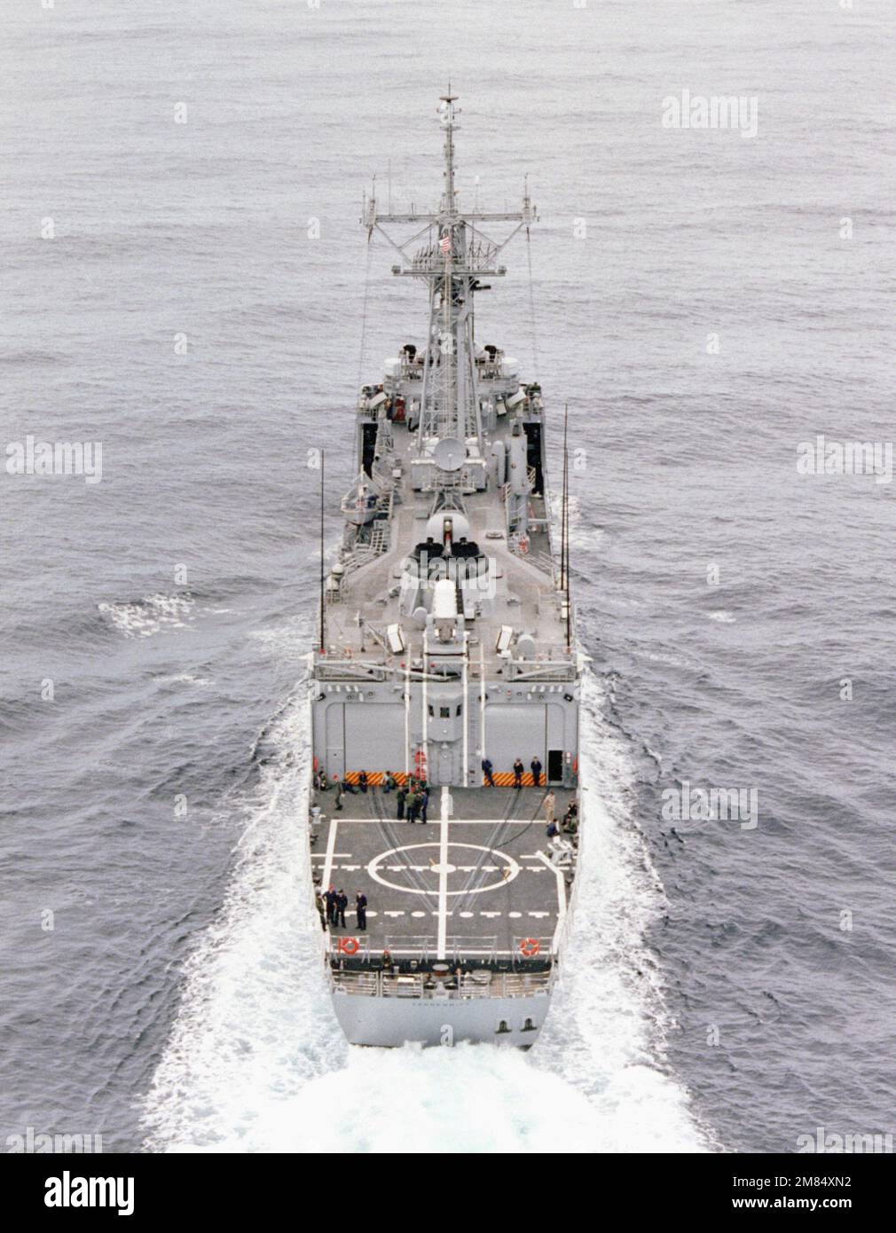An elevated stern view of the guided missile frigate USS VANDEGRIFT ...