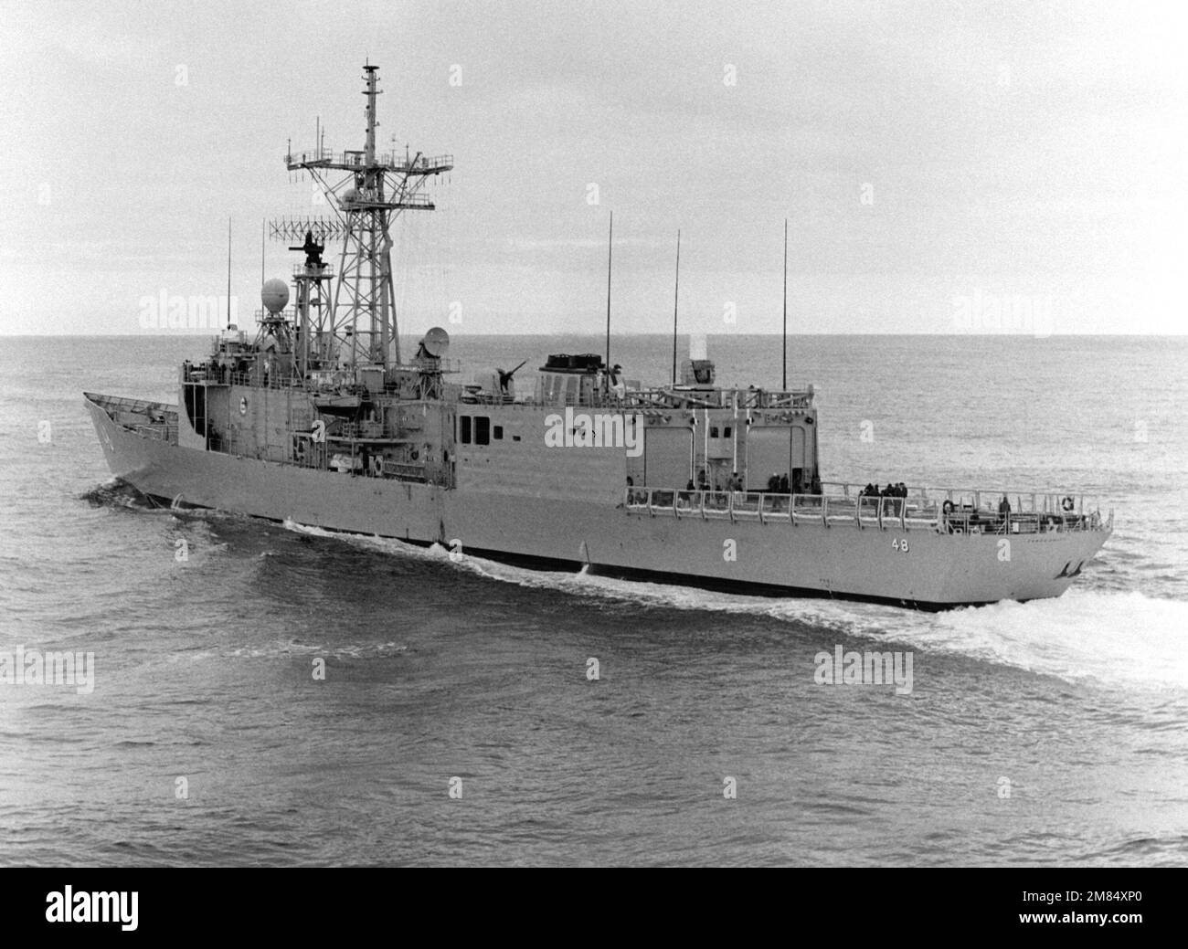 An elevated port quarter view of the guided missile frigate USS ...