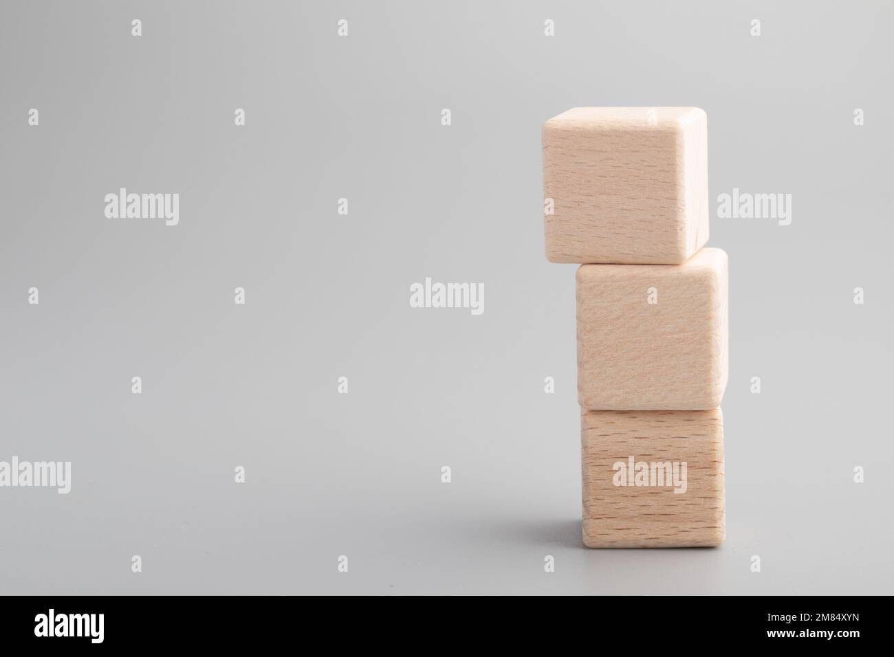 Simple empty wooden dice, one blank cubes made of wood with one central ...