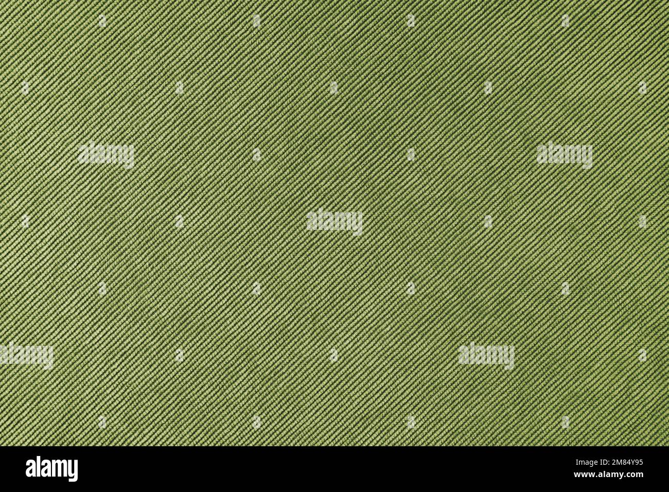 Texture background of velours khaki fabric. Upholstery velveteen ...