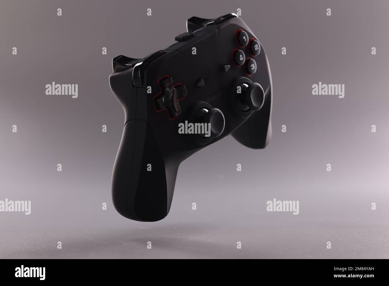 Black gamepad hi-res stock photography and images - Alamy