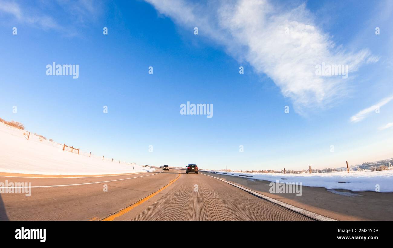 Driving in suburban area Stock Photo - Alamy
