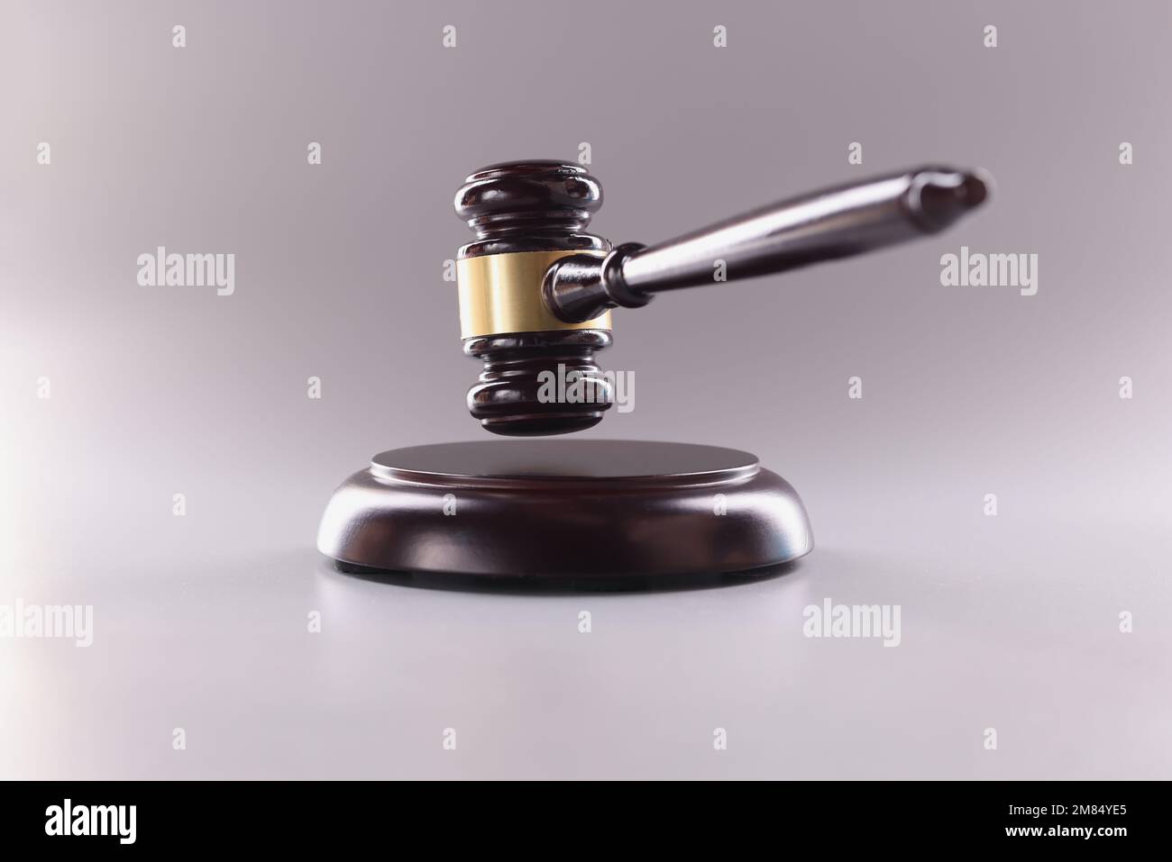 Brown wooden judge gavel in air closeup Stock Photo - Alamy