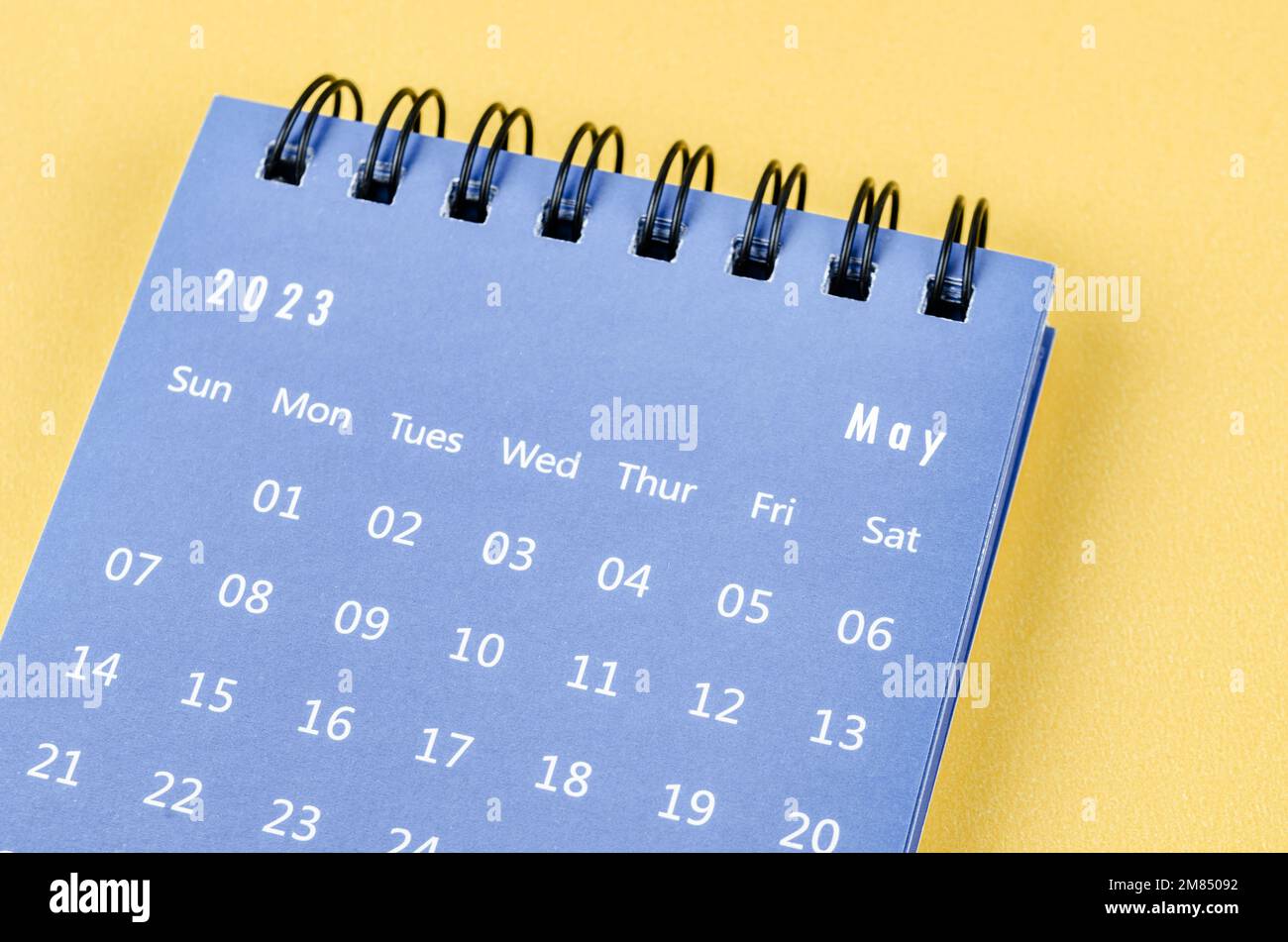 May 2023 Monthly desk calendar for 2023 year on yellow background Stock ...