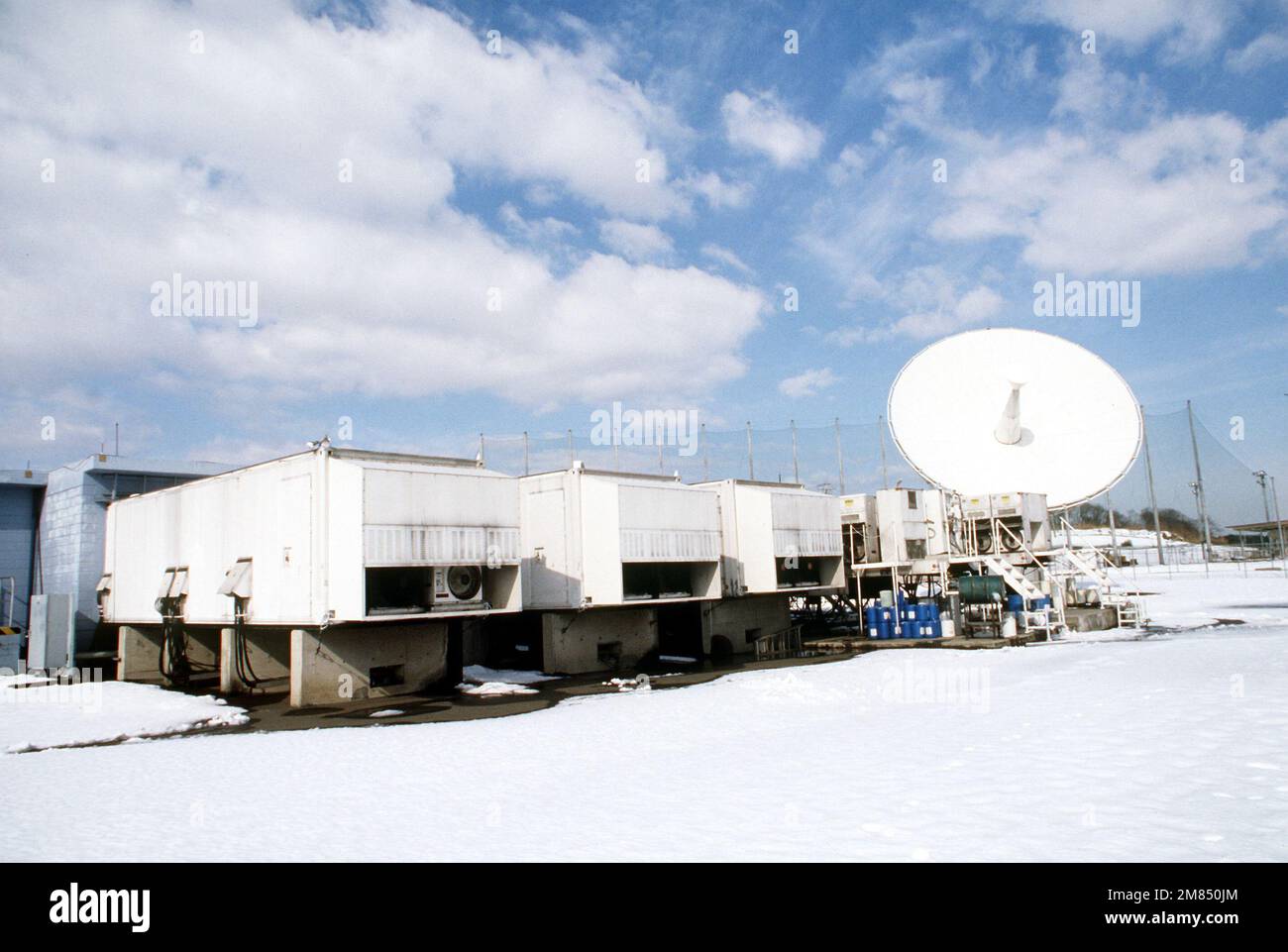 An exterior view of the Digital Communications Subsystem Complex. Base ...