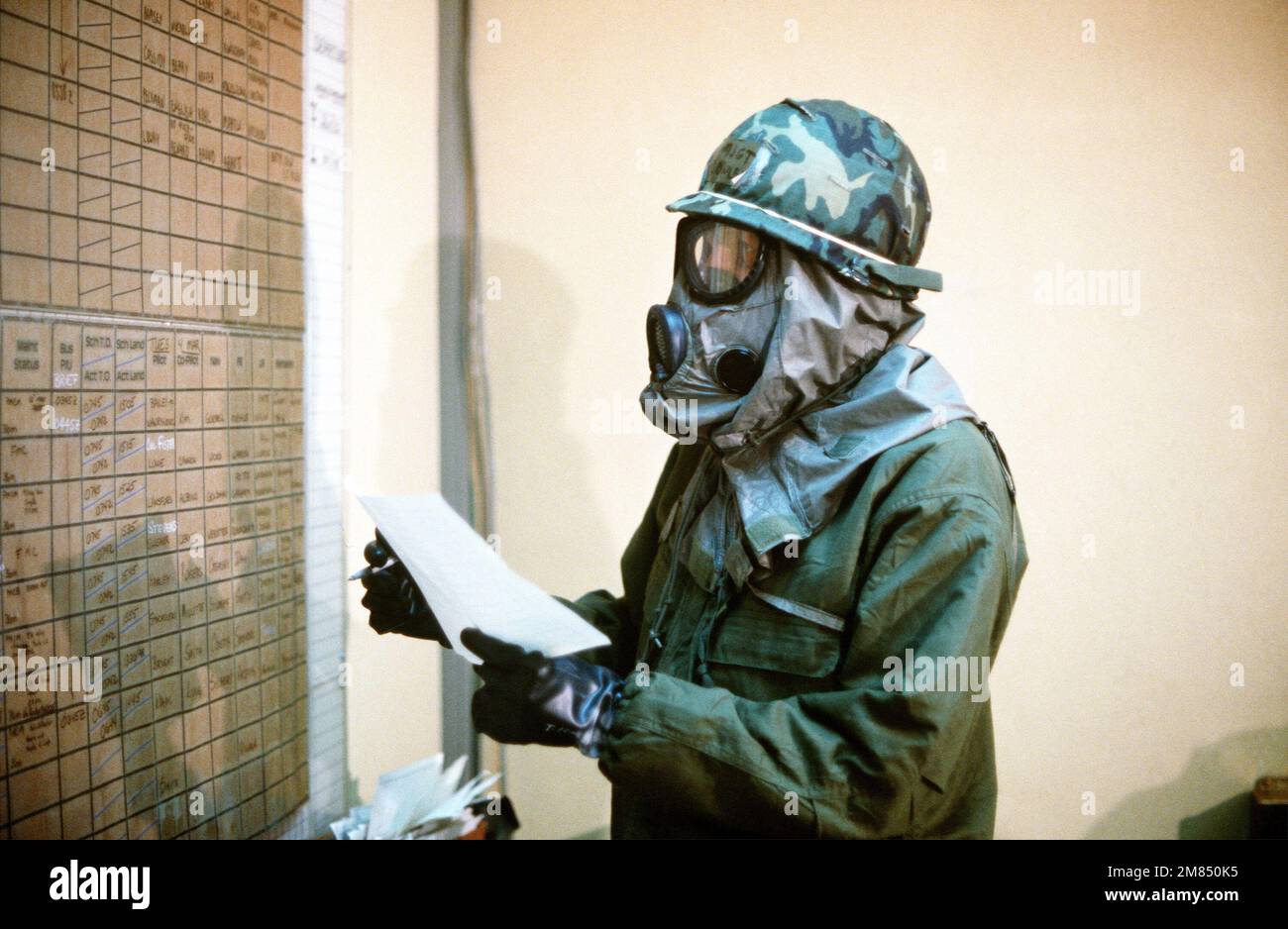 MSGT Cowley, 37th Tactical Airlift Squadron, checks an assignment chart ...