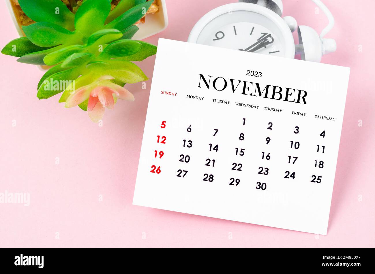 November 2023 Monthly calendar for 2023 year with vintage alarm clock ...