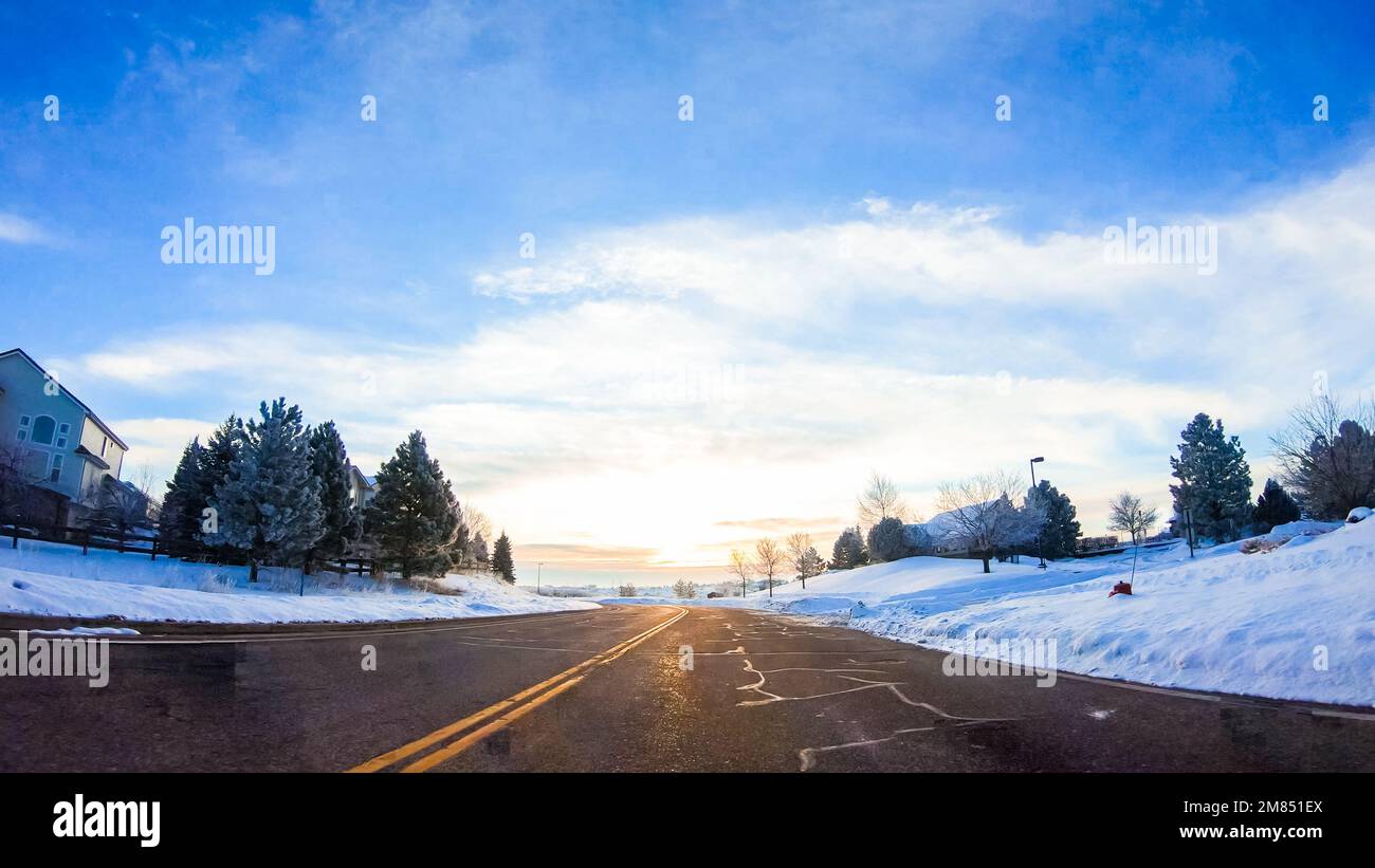 Driving in suburban area Stock Photo - Alamy