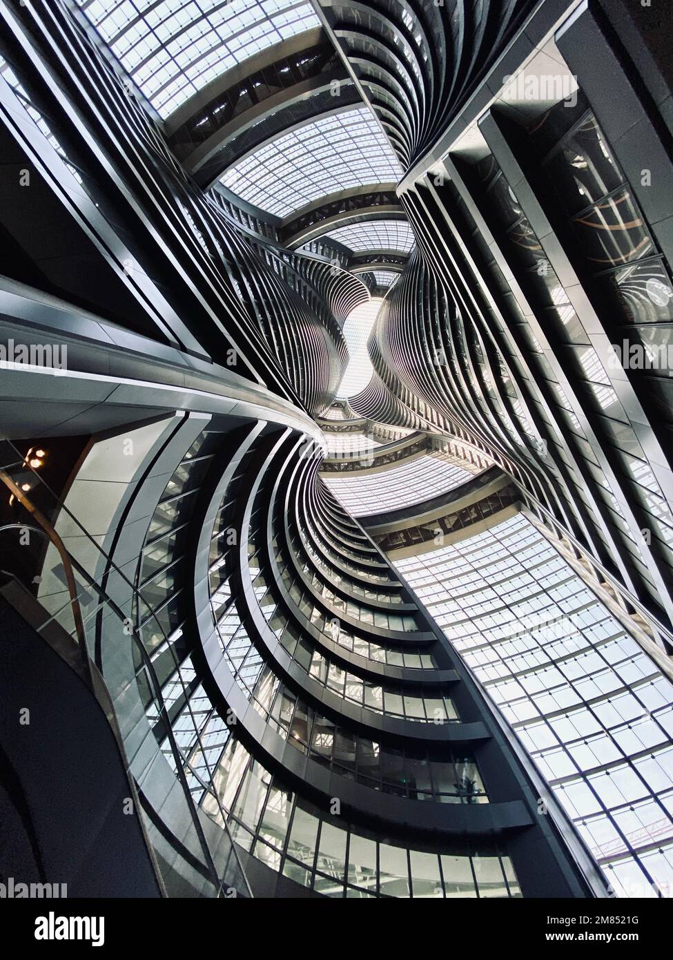 A vertical interior of Leeza SOHO (Li Ze Tower), a Skyscraper in the ...