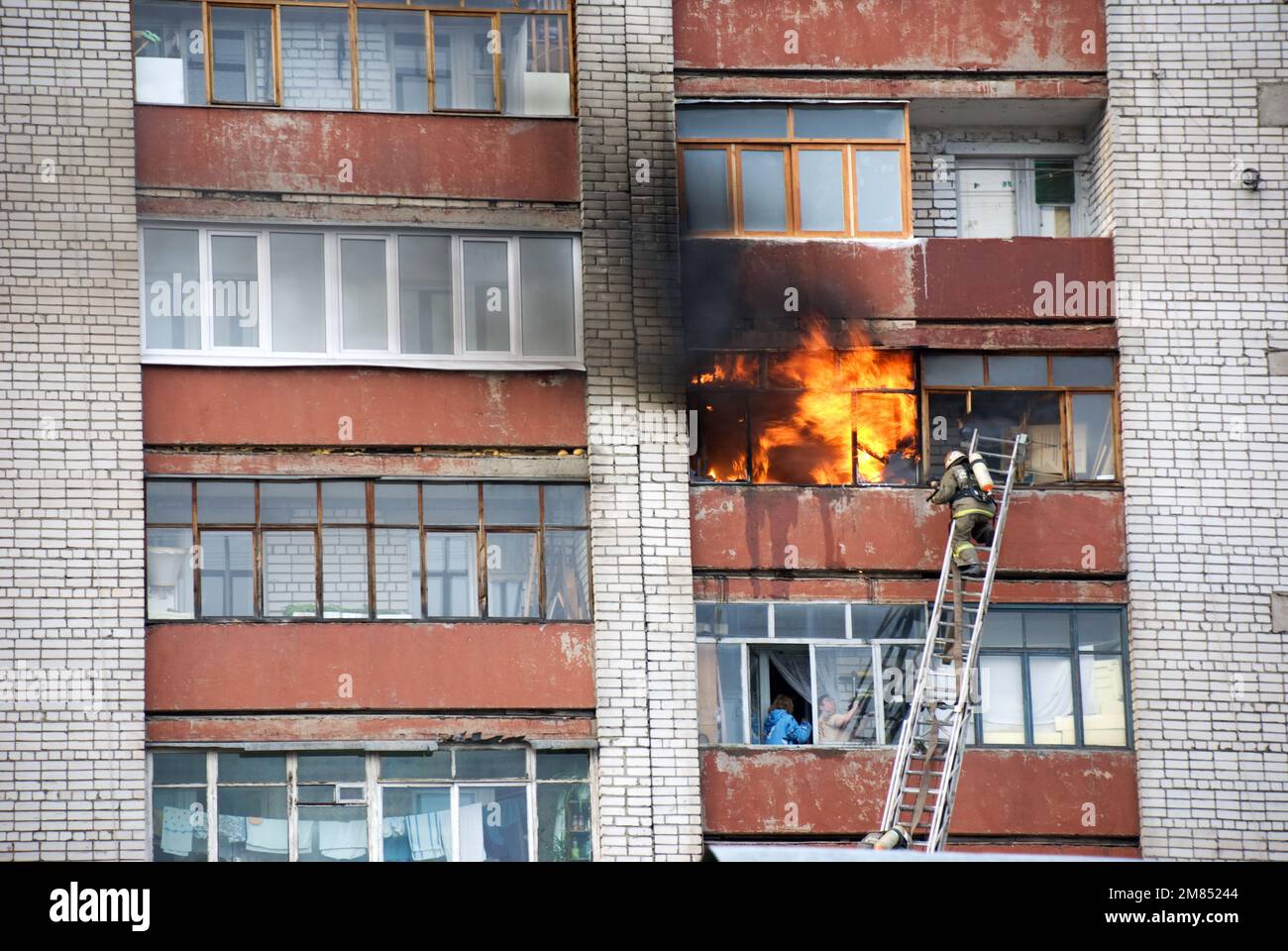 A big fire in one of the apartments of a large tenement-house Stock ...