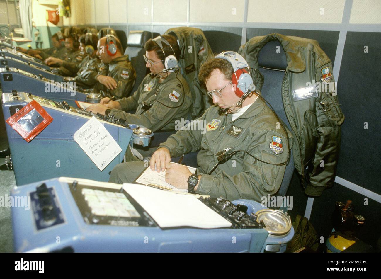 Members of the 7th Airborne Command and Control Squadron man their ...