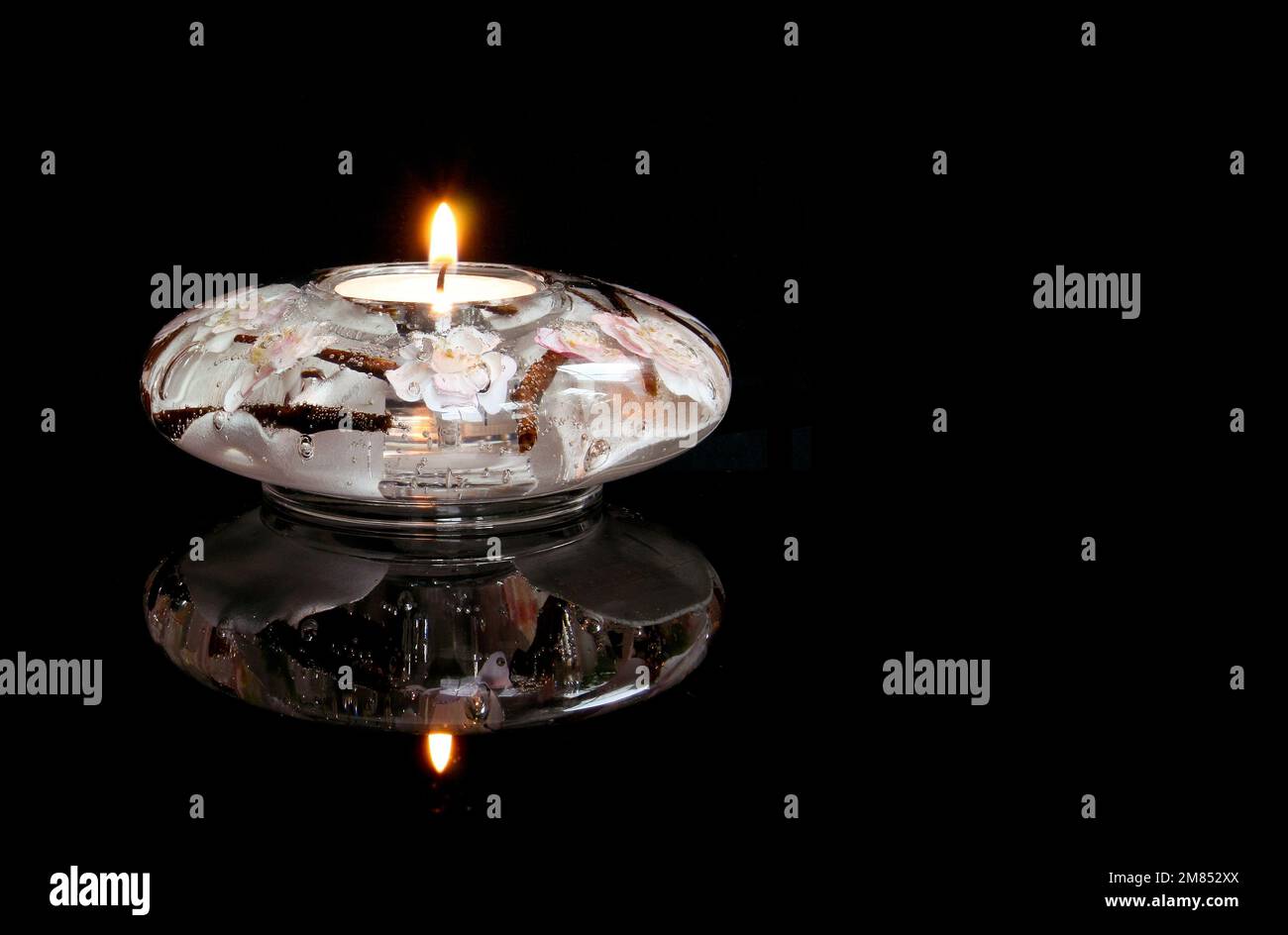 Japanese Candle light against black background Stock Photo - Alamy