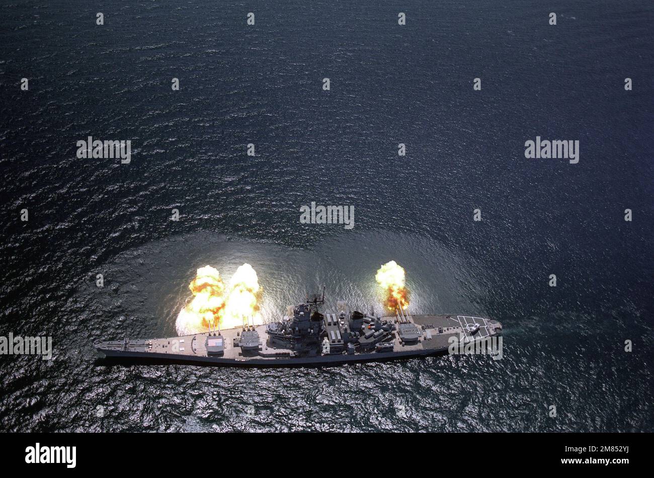 An overhead view of the three Mark 7 16-inch/50-caliber gun turrets of ...