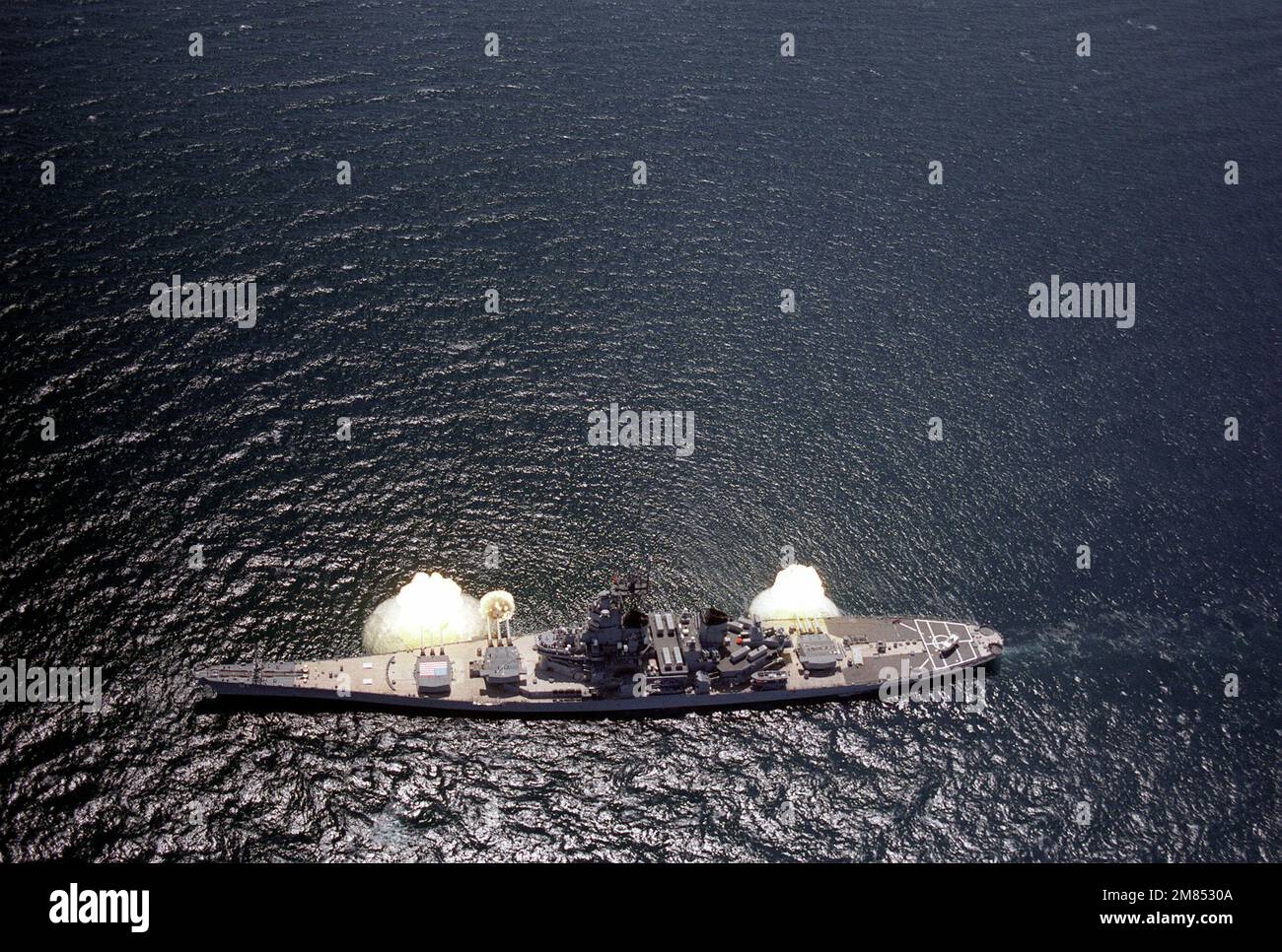 An overhead view of the three Mark 7 16-inch/50-caliber gun turrets of ...