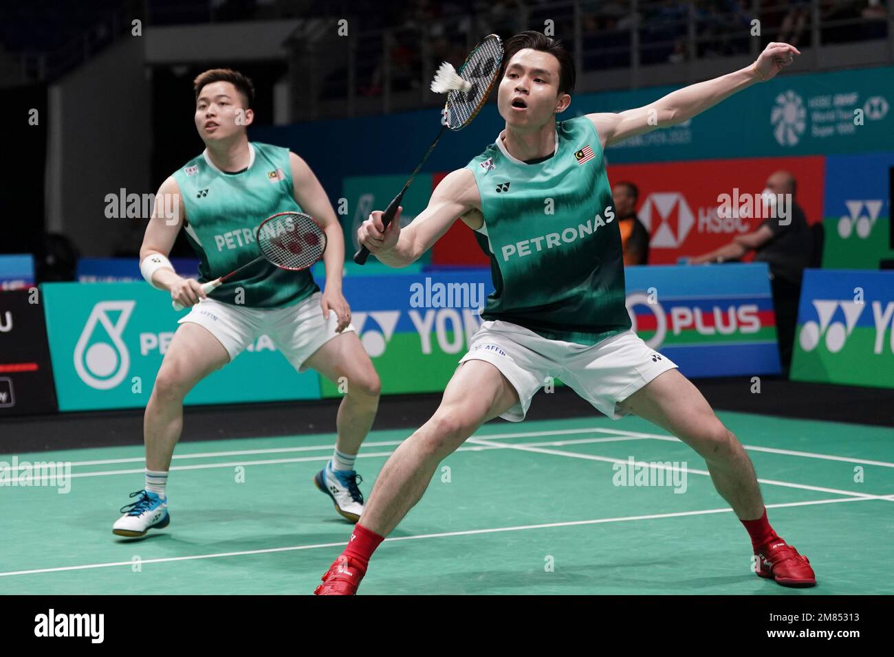 Malaysia's Soh Wooi Yik, right, plays a shot near his mate Aaron Chia ...