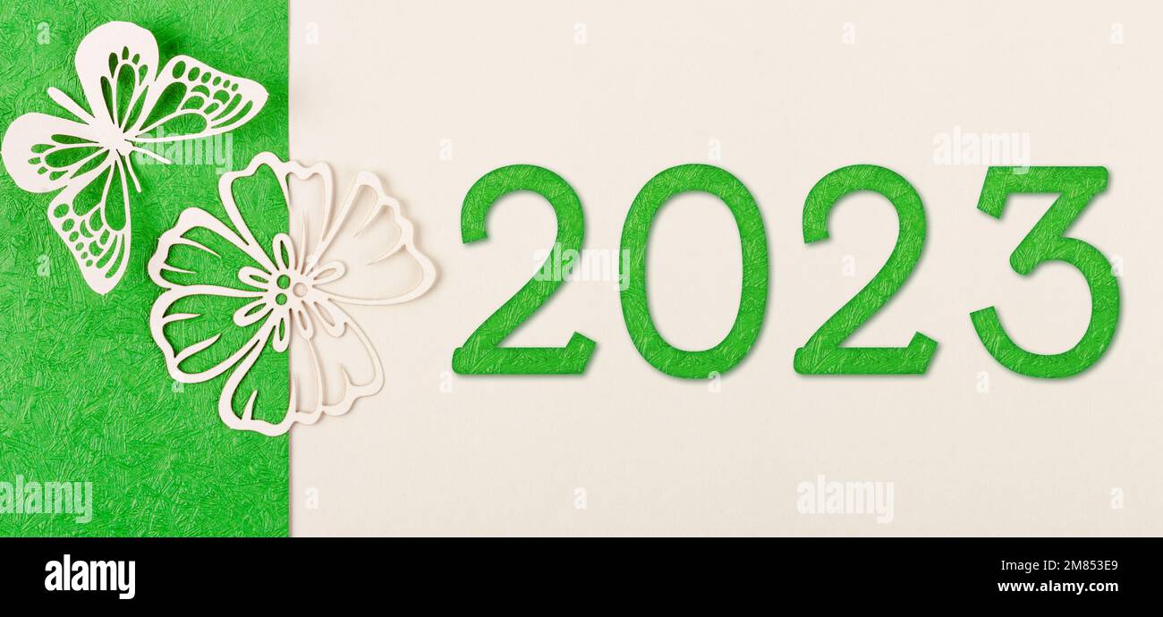 Green 2023 number and butterfly paper on greeting cards, holiday ...