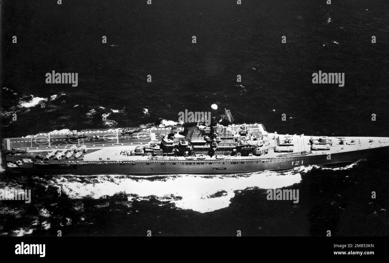 An elevated starboard beam view of a Soviet Kiev class aircraft carrier ...