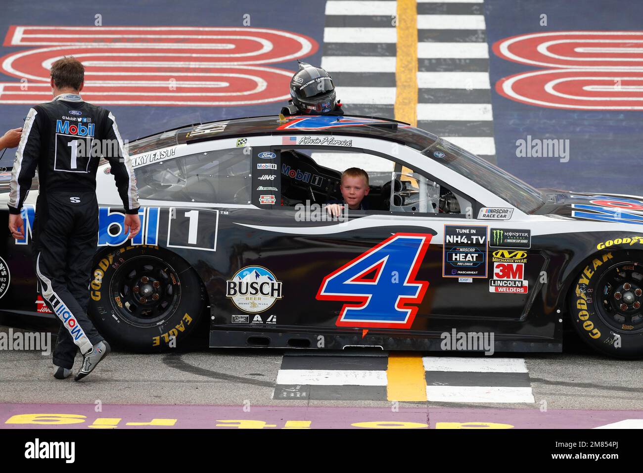FILE - Kevin Harvick's son, Keelan, looks out from his car after ...