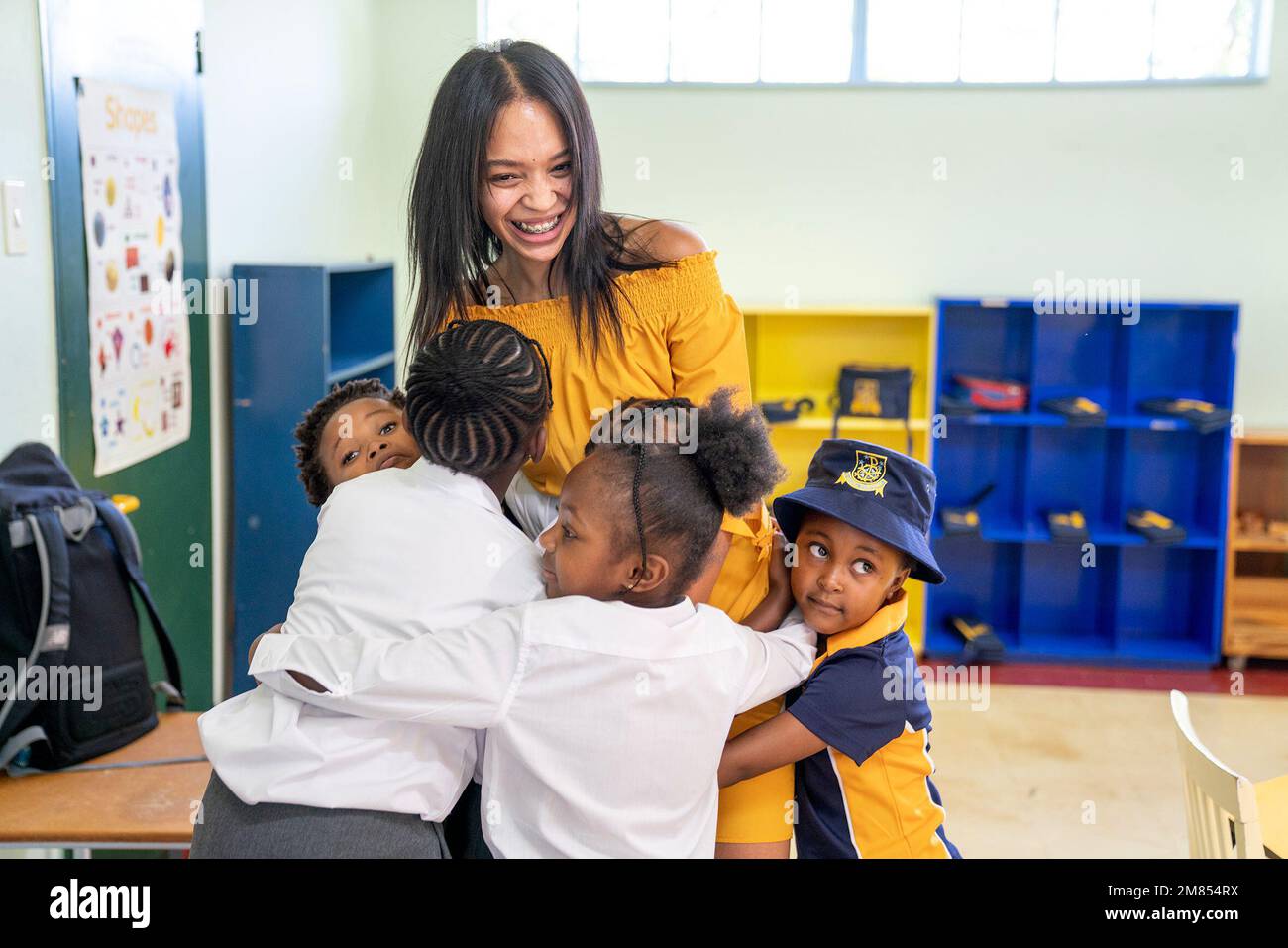 Johannesburg, South Africa. 11th Jan, 2023. Students hug their teacher ...