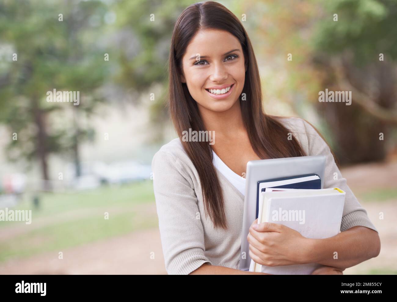 Shes an A Grade Student. A beautiful young student standing outside ... Shes an A Grade Student. A beautiful young student standing outside ...