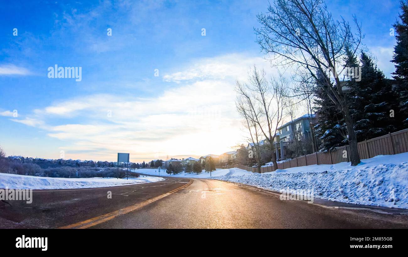 Driving in suburban area Stock Photo - Alamy