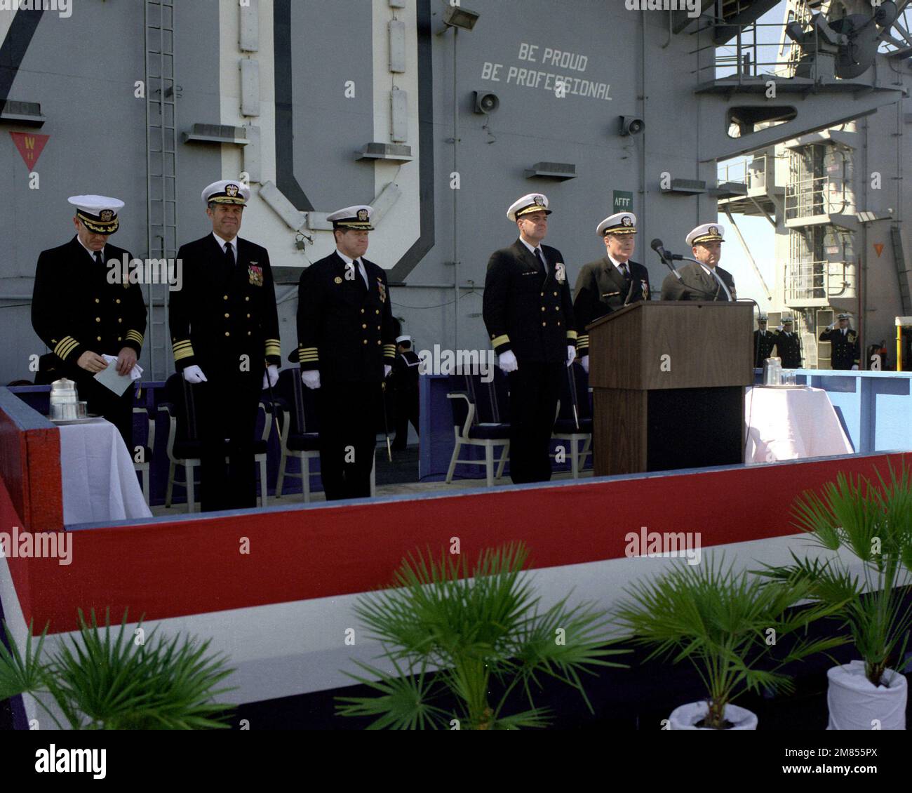 Officers stand at attention during the change of command ceremony ...