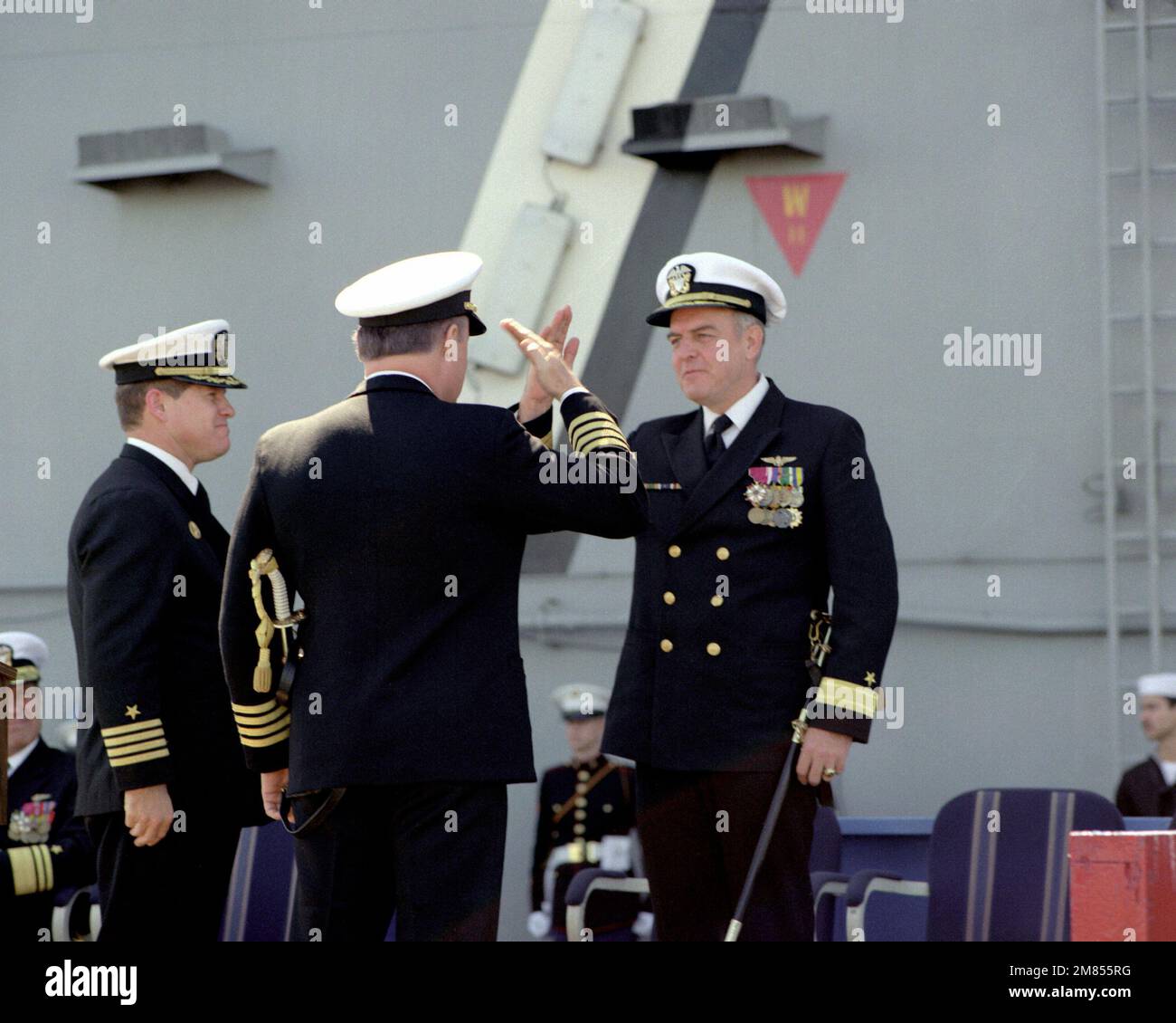 Rear Adm. (lower half) Edward W. Clexton Jr., commander, Carrier Group ...