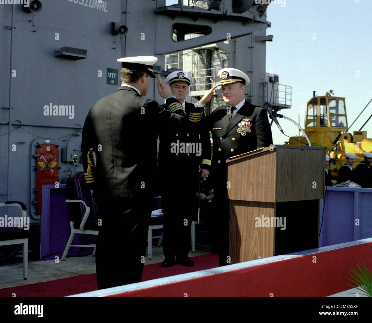 CAPT. George D. O'Brien Jr., right, and CAPT. Thomas A. Mercer exchange ...