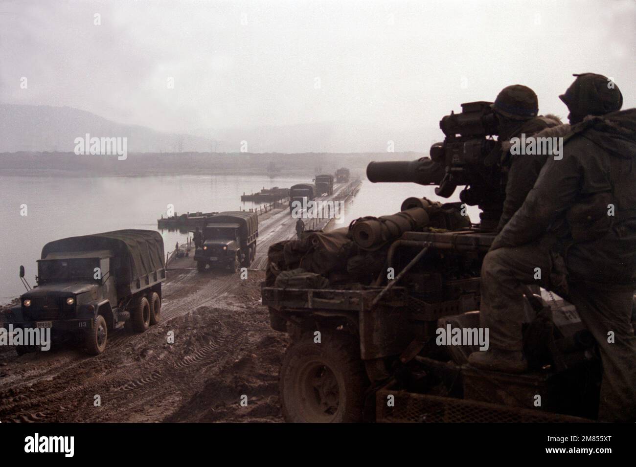 A tube-launched, optically-tracked, wire-guided missile (TOW) mounted ...