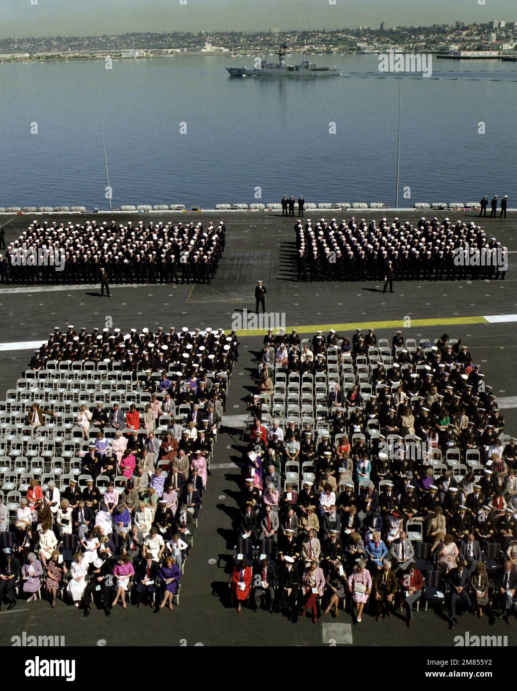 An overhead view of guests and crewmen during the change of command ...