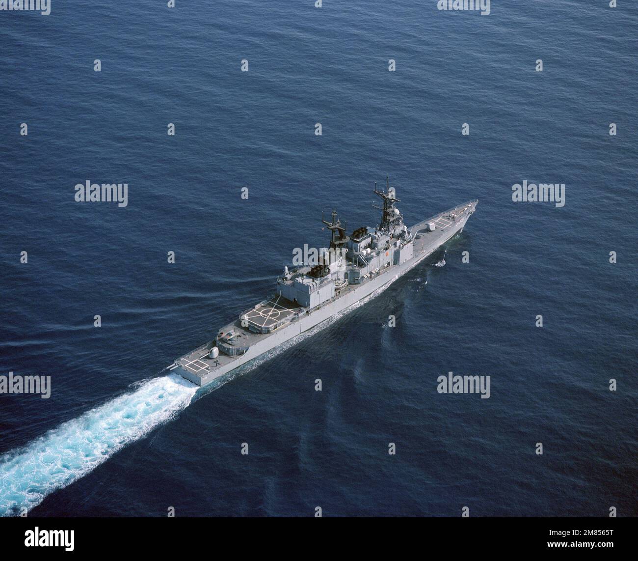 An elevated starboard quarter view of the guided missile destroyer USS ...