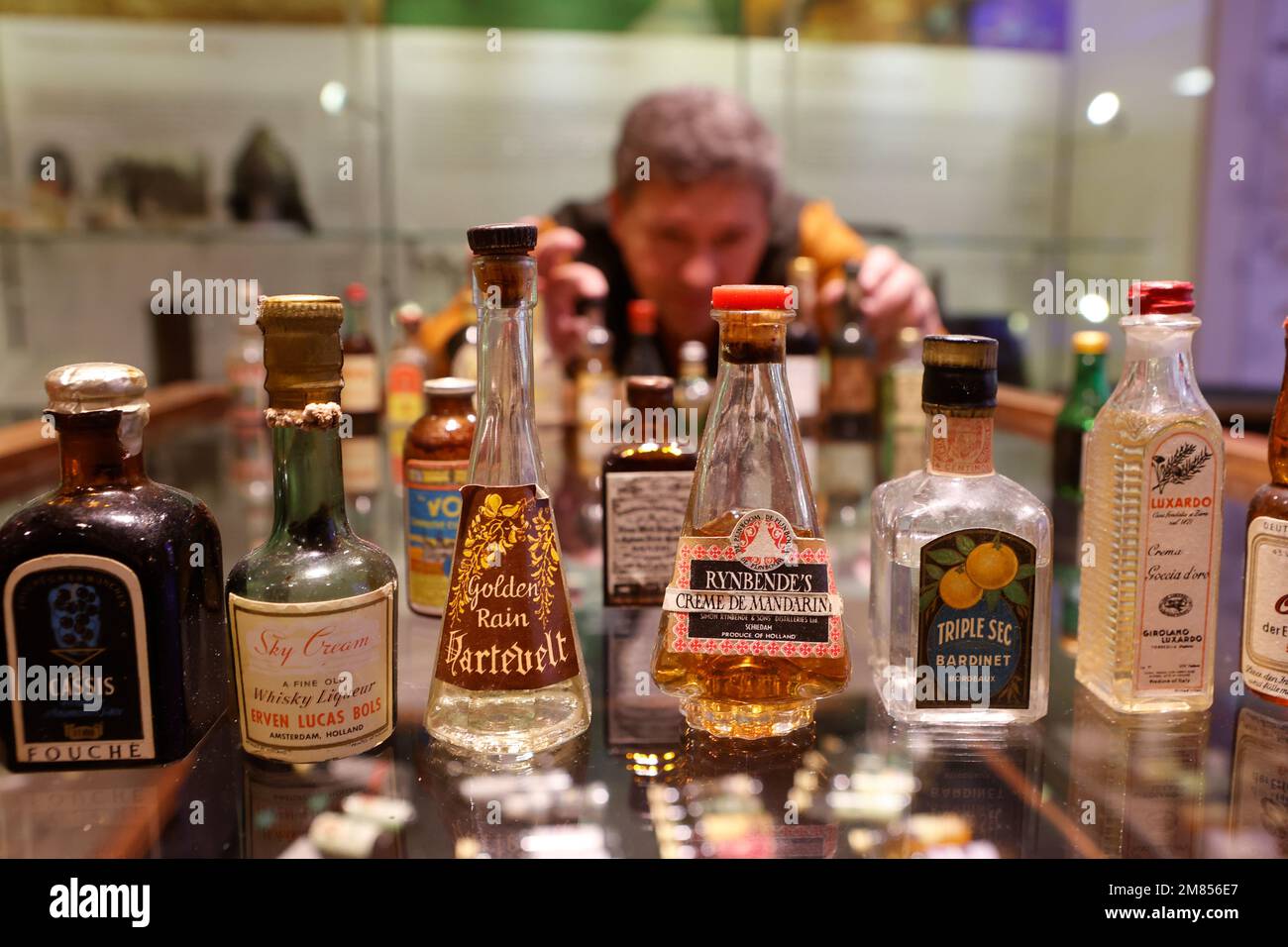 Nordhausen, Germany. 12th Jan, 2023. Miniature bottles stand on a glass ...