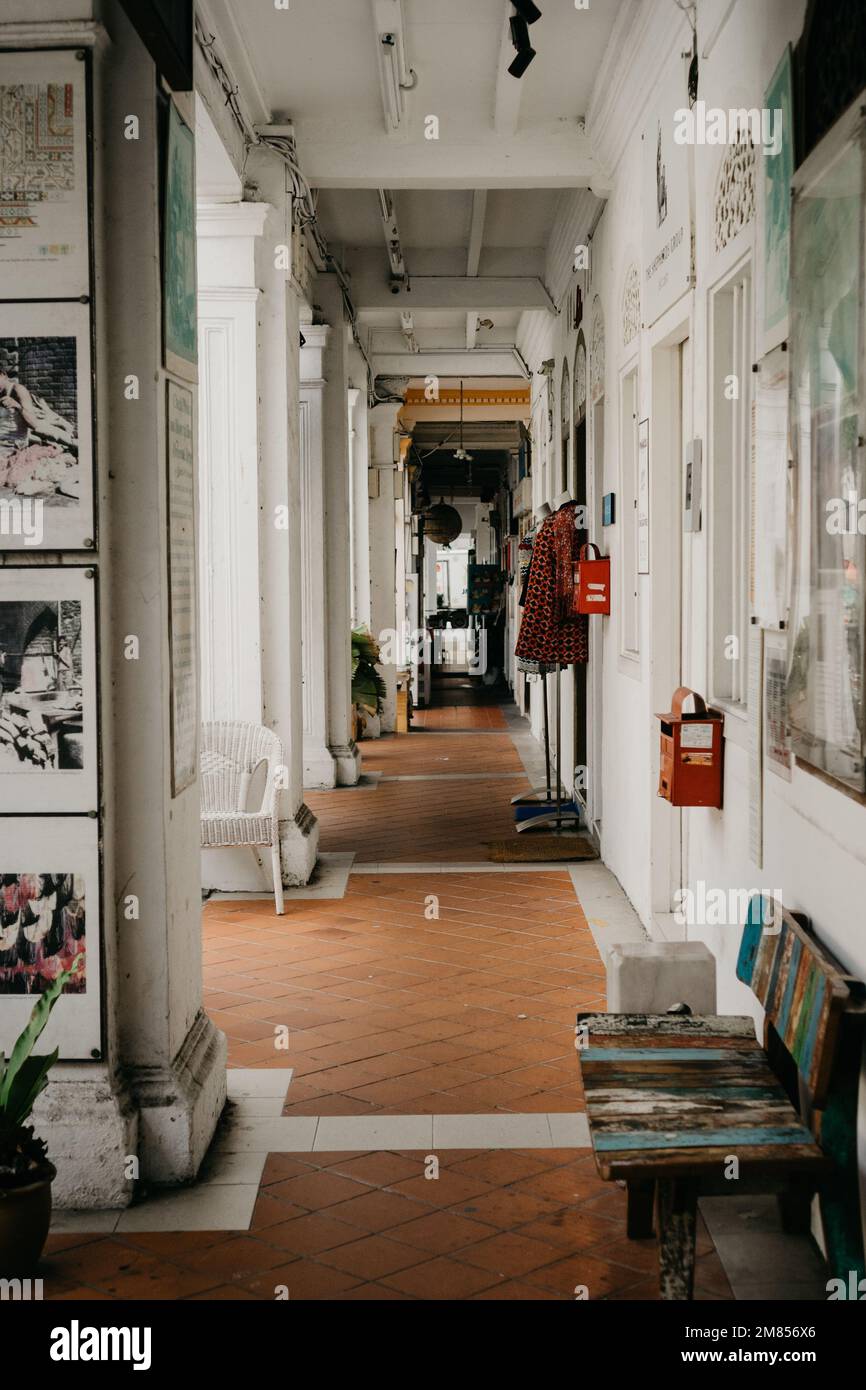 Eclectic hallway in Singapore's textile district Stock Photo - Alamy