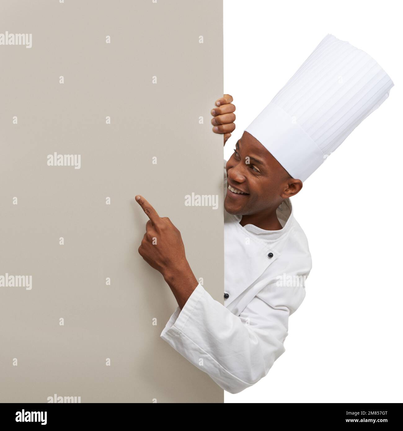 Giving a chefs approval. Studio shot of a chef standing with a blank ...