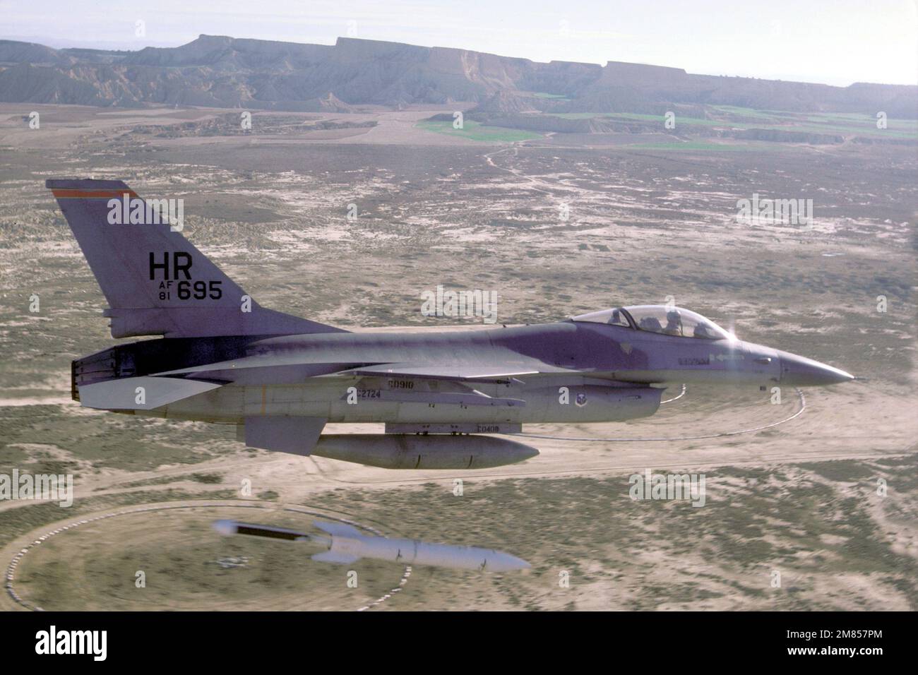 An air-to-air right side view of a 313th Tactical Fighter Squadron F ...