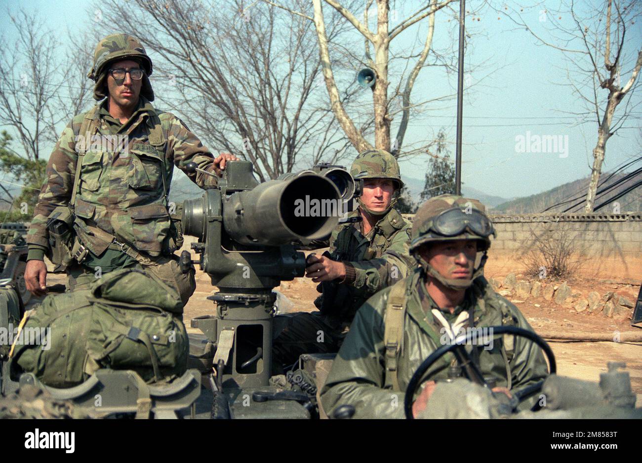 Members of a tube-launched, optically-tracked, wire-guided (TOW ...