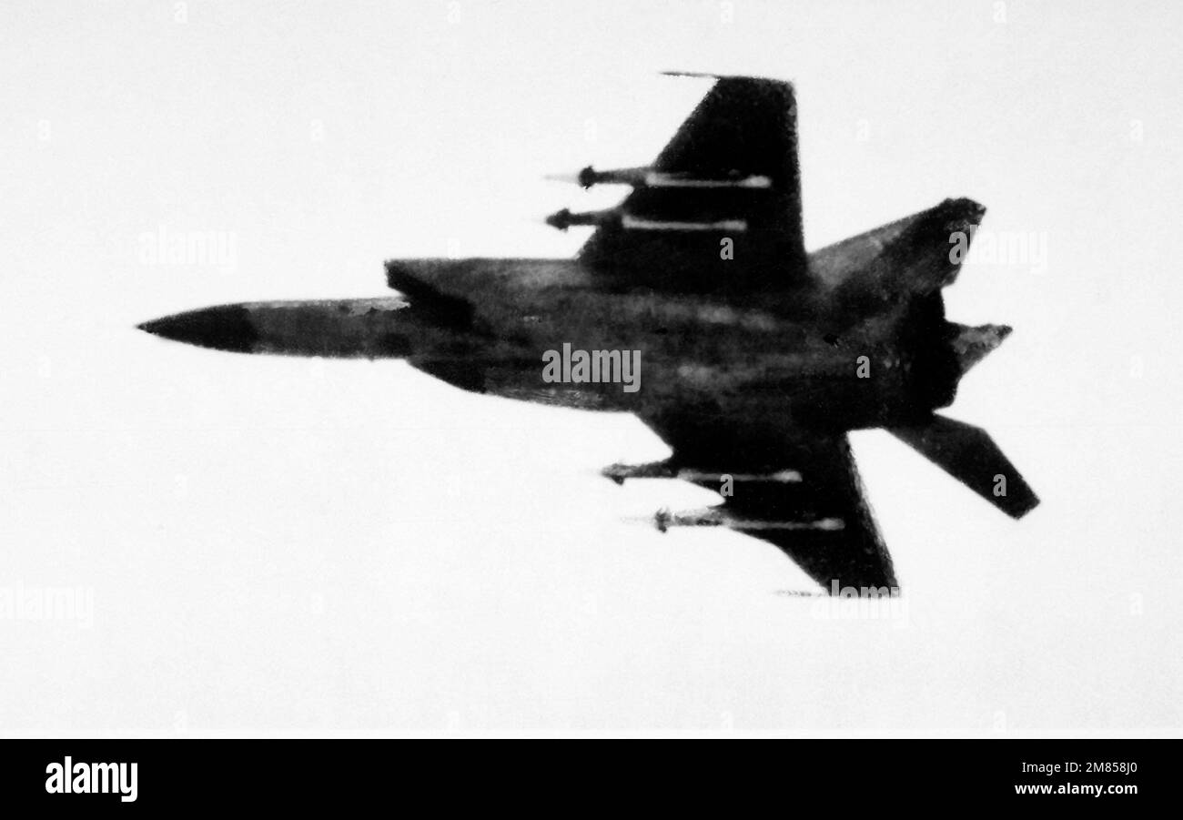 A left underside view of a Soviet MiG-25 Foxbat aircraft in flight ...