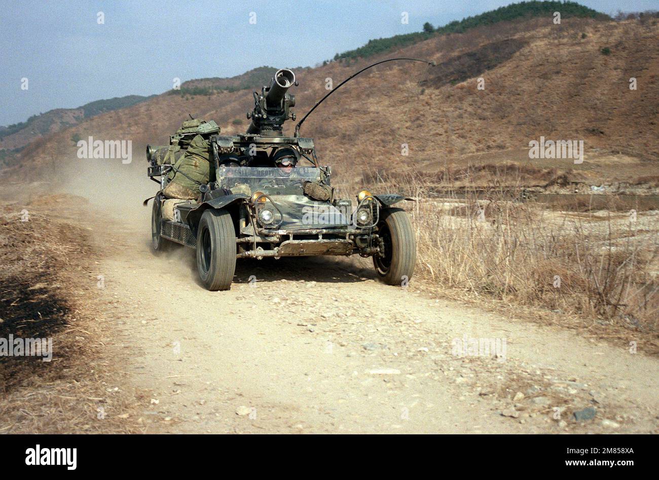 Members of the 2nd Bn., 1ST Inf., 9th Inf. Div. (Light), drive their ...